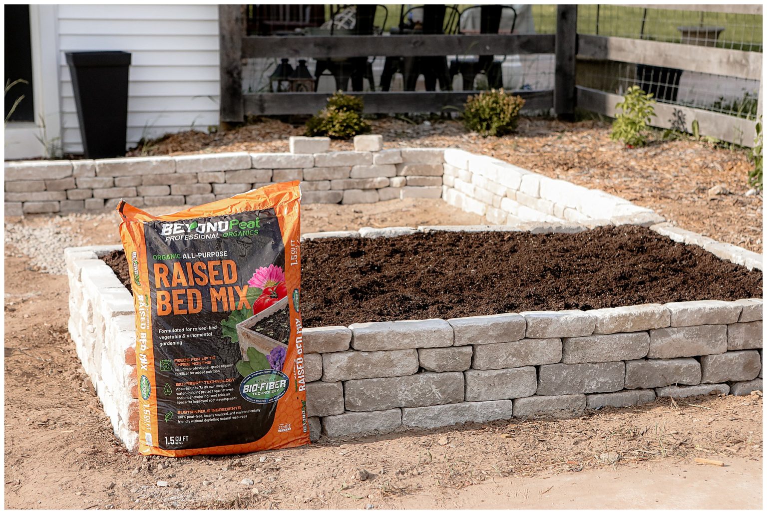 How to build a stone garden bed - Sugar Maple Farmhouse